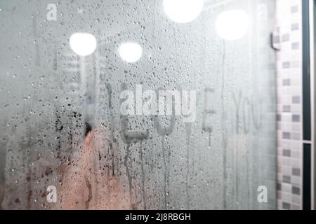 text I love you on shower glass copy space Stock Photo - Alamy