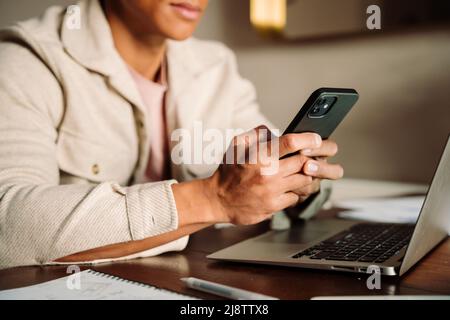 An asian man texting on the cellphone Stock Photo - Alamy