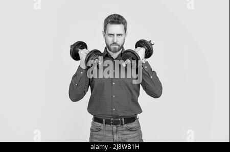 successful strong mature man with beard training with barbells, copy ...