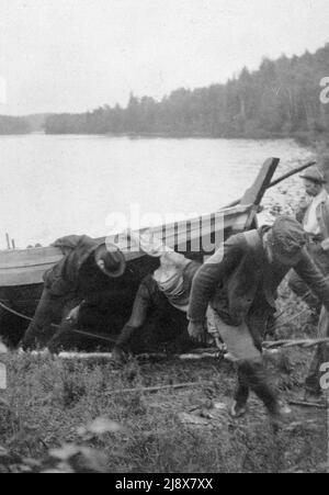 Portaging a York boat Stock Photo - Alamy