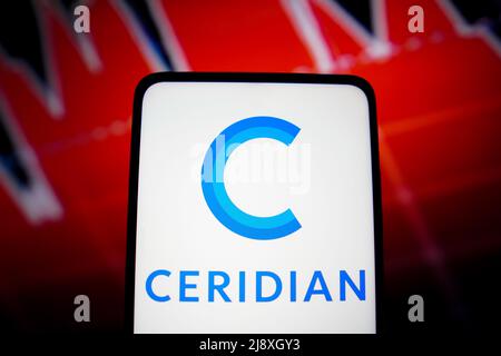 In this photo illustration the Ceridian HCM Holding logo seen displayed ...