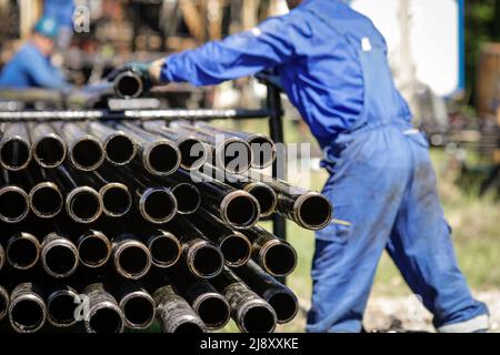 Production casing and tubing in offshore oil and gas platform structure ...