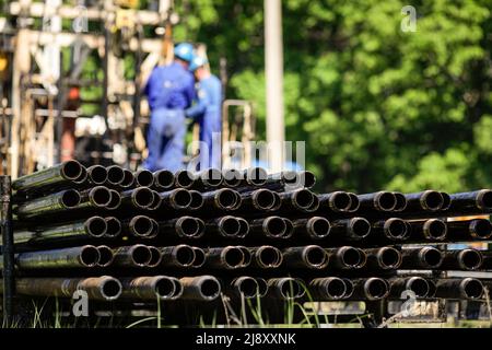 Production casing and tubing in offshore oil and gas platform structure ...