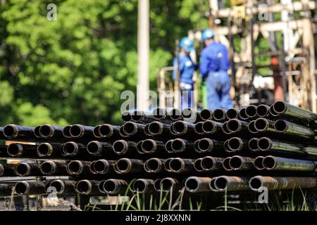 Production casing and tubing in offshore oil and gas platform structure ...