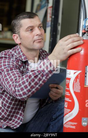 Engineer checking Industrial fire control system,Fire Alarm controller ...