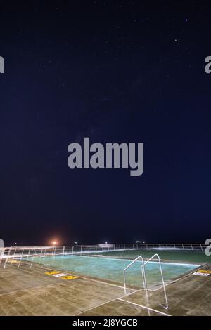 Towradgi Beach ocean pool at night Stock Photo - Alamy