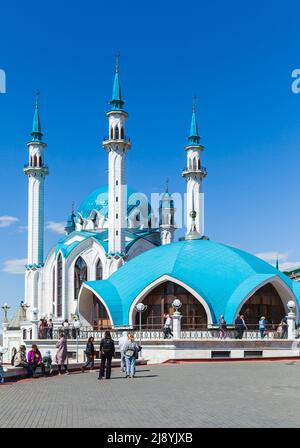 Kazan, Russia - May 7, 2022: Tourists walk the street near Soyembika ...