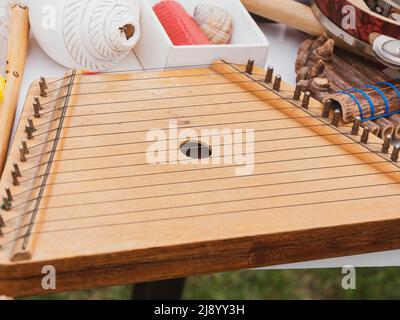 Tsymbaly ethnic musical instrument striking two beaters. Musician man ...