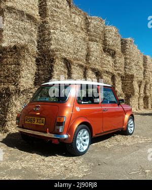 Volcano Orange Rover Mini Cooper Stock Photo - Alamy