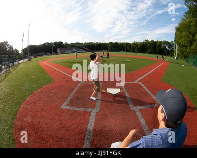 Children's baseball game at home plate POV Stock Photo - Alamy