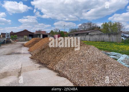 Storage of bark mulch on a farm, Bavaria, Germany Stock Photo - Alamy