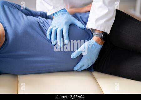 Pregnant Woman At Chiropractor. Baby Breech Physiotherapy And Pregnancy ...