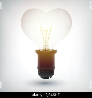 Glowing lightbulb with plastic base concept in shape of heart as symbol ...