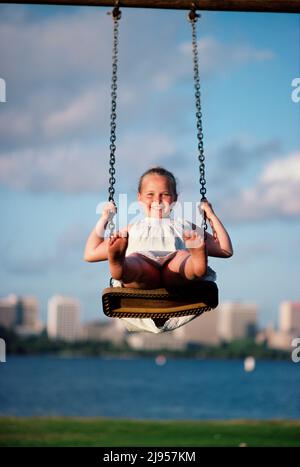 Children at play by the riverside Stock Photo - Alamy