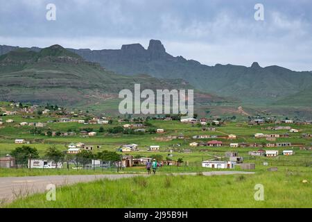 Drakensberg Mountain Range and rural settlement in the countryside of ...