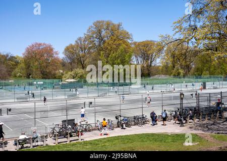 Players enjoying a spring afternoon at Central Park Tennis Center in ...