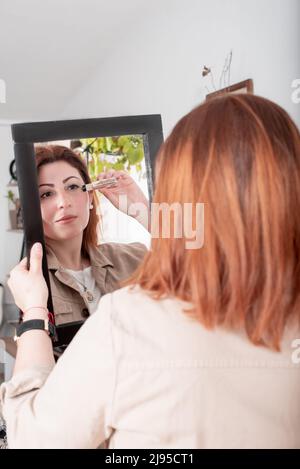 woman breathing and inhaling aroma from a doterra vaporizer Stock Photo ...