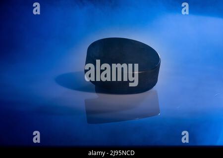 Helsinki / Finland - MAY 20, 2022: Closeup of a rubbery ice hockey puck ...
