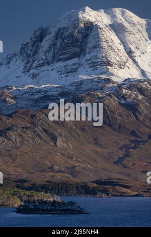 The mountain Slioch covered in snow in spring, Wester Ross, Highlands ...