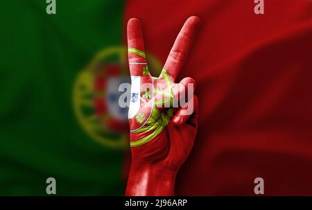 Hand making the V victory sign with flag of mongolia Stock Photo - Alamy