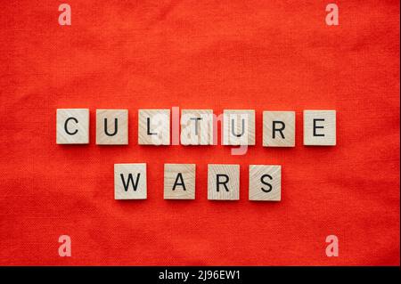 Culture wars concept with tile lettering Stock Photo - Alamy