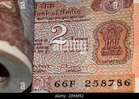 Old Two Rupee notes combined on the table, India money on the rotating ...