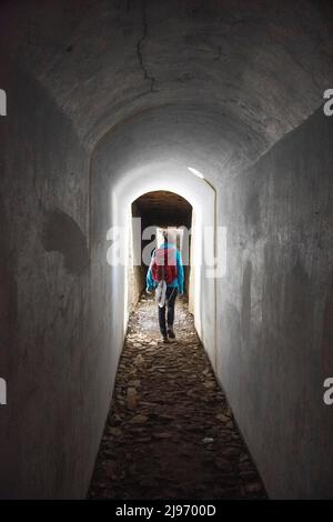 Women walking in bunker Stock Photo - Alamy