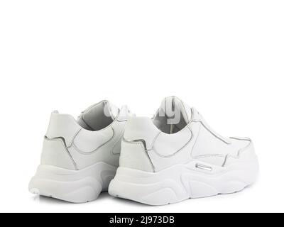 White classic leather trainers. Casual women's style. White lacing and ...