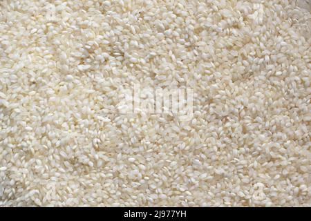 Raw whole dried Idli parboiled rice Stock Photo - Alamy