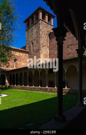 Graceful Gothic arcades with slender columns and sculpted capitals ...