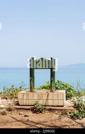 Water sea faucet. tap near the sea water. Desalination. Concept of ...