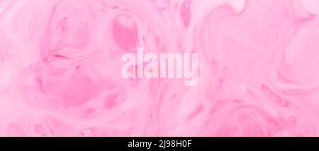 Light pink fluid art background. Blurred pink shapes on a liquid ...