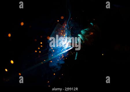 Metal welding. Fire from operation of welding machine. Manufacture of ...