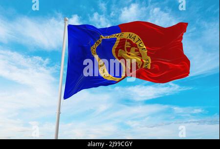 official flag of Comanche Nation people ethnic, USA at cloudy sky ...