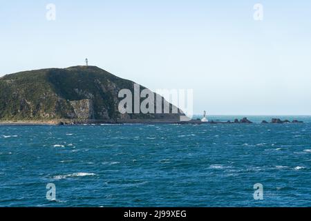 Pencarrow Heads lighthouses and coastal scene when leaving Wellington ...