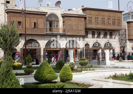 Aleppo, Syria. A traditional old house with rooms looking onto an ...
