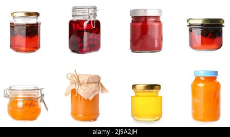 Set of jars with sweet jams and honey on white background Stock Photo ...