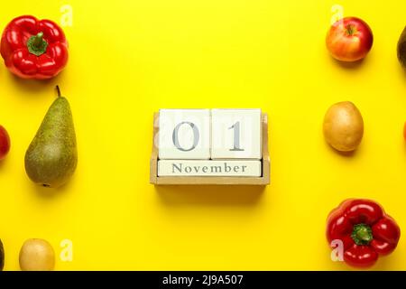 Cube calendar with date NOVEMBER 1, fresh fruits and vegetables on ...