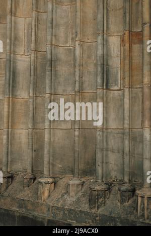 The exterior design of an old building with damaged wall and the paint ...