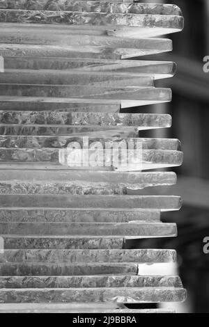 Layers of glass set upon one another as a stack of horizontal plates in ...