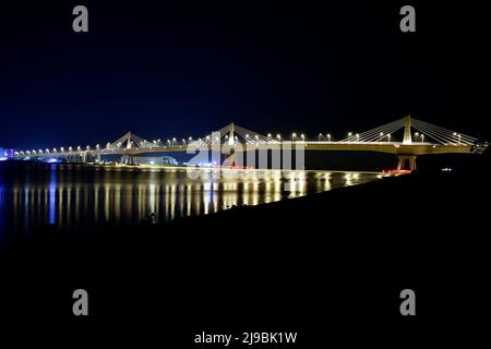 Iconic Payra bridge illuminates at night over River Payra in Bangladesh ...