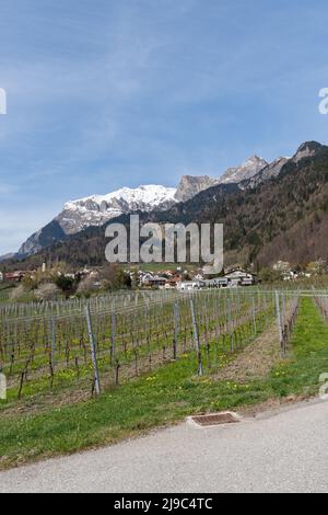 Maienfeld, Grison, Switzerland, April 11, 2022 Empty street along the ...