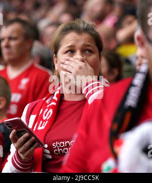 A fan of Liverpool reacts during the English Premier League soccer ...