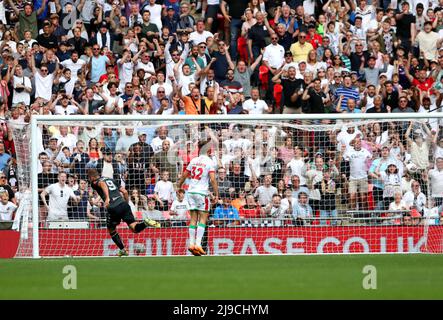 Bromley's Michael Cheek scores their side's first goal of the game from ...