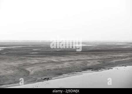 The beautiful and curious tidal mud flat Stock Photo - Alamy