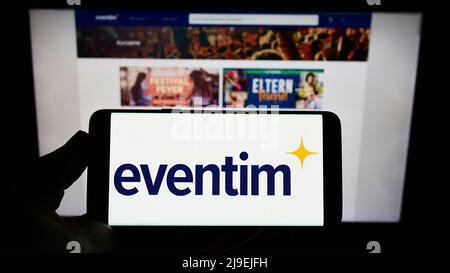 Mobile phone with webpage of German ticketing company CTS Eventim AG Co ...