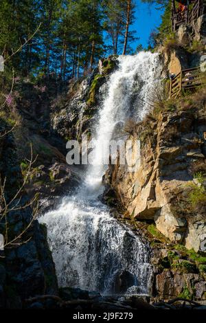Kamysh waterfall at sunset light, spring time in the Altai Republic ...