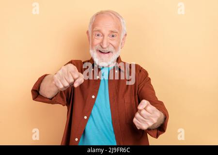 Photo of nice elder grey hairdo lady hold books wear khaki shirt ...