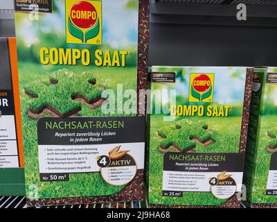 Compo fertilizer for lawn in a market Stock Photo - Alamy