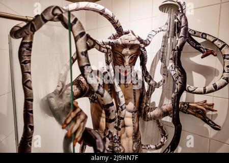 Man taking shower in spooky Medusa costume Stock Photo - Alamy